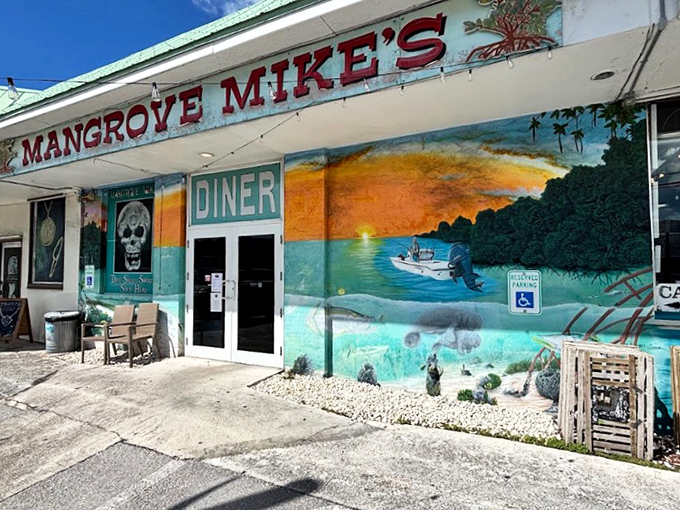 The vibrant exterior of Mangrove Mike's welcomes you with a mural that's pure Florida Keys&mdash;where breakfast dreams and underwater scenes collide in technicolor splendor.
