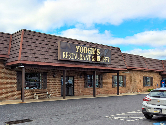 The brick exterior of Yoder's welcomes hungry travelers with its wooden shutters and simple signage &ndash; like a warm handshake before the culinary embrace inside.