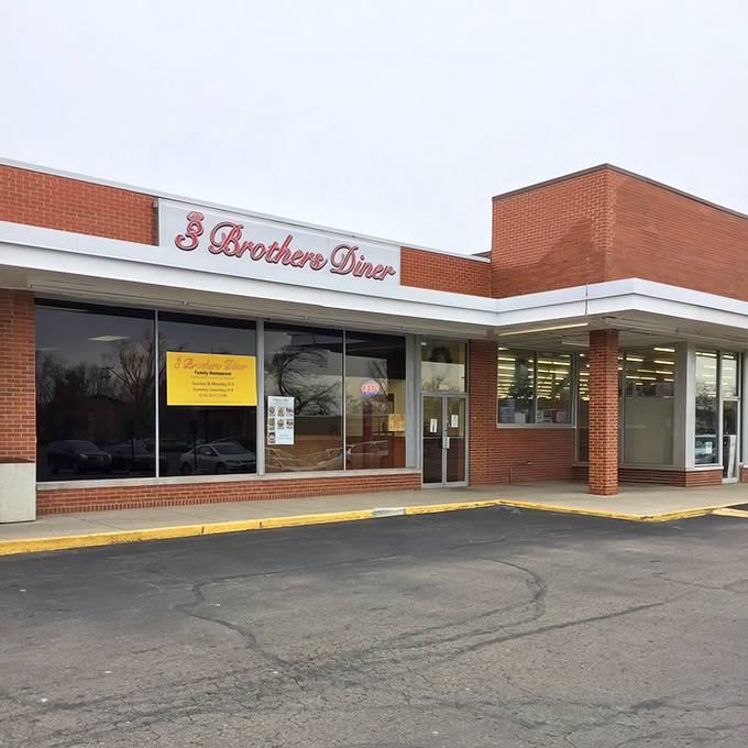 The unassuming brick exterior of 3 Brothers Diner hides culinary treasures within, like finding a Picasso at a yard sale. Classic diner architecture with zero pretension.