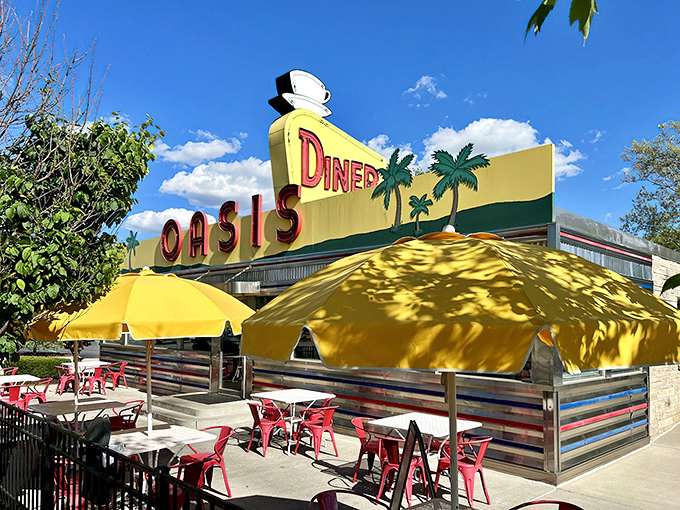 The sunshine-yellow exterior of Oasis Diner gleams like a beacon of hope for hungry travelers&mdash;mid-century Americana preserved in all its neon glory.