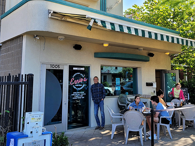 The classic green and white striped awning of Ernie's welcomes hungry patrons like an old friend inviting you over for breakfast.