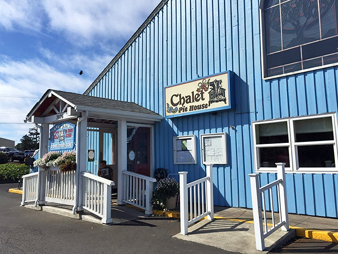 Bathed in Oregon sunshine, the Chalet's distinctive blue siding and welcoming entrance create the perfect first impression &ndash; like finding the Swiss Alps' coziest bakery mysteriously transported to Newport's coastline.