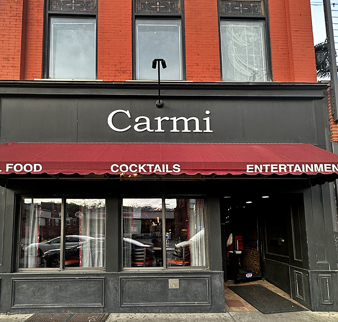 The iconic red awning of Carmi Soul Food Express beckons hungry Pittsburghers like a Southern lighthouse in the Steel City's culinary landscape.