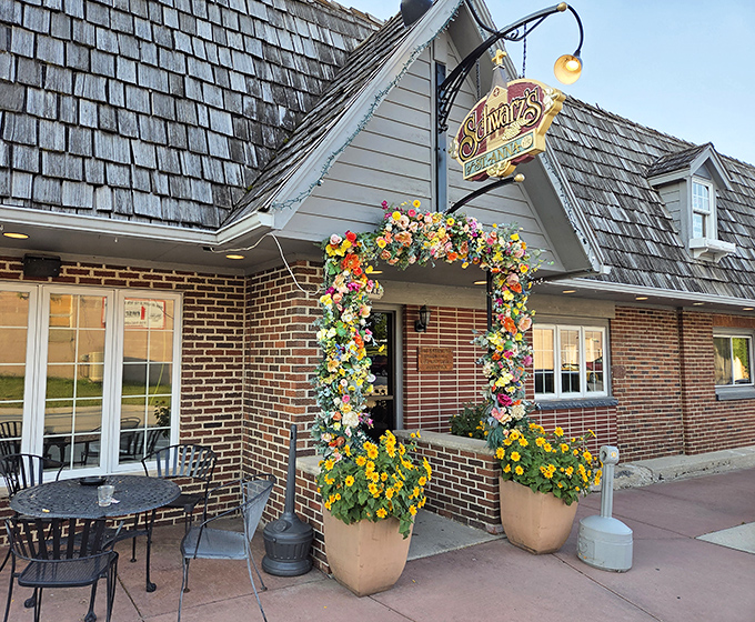 The floral archway at Schwarz's entrance isn't just decoration&mdash;it's nature's way of saying "abandon your diet, all ye who enter here."