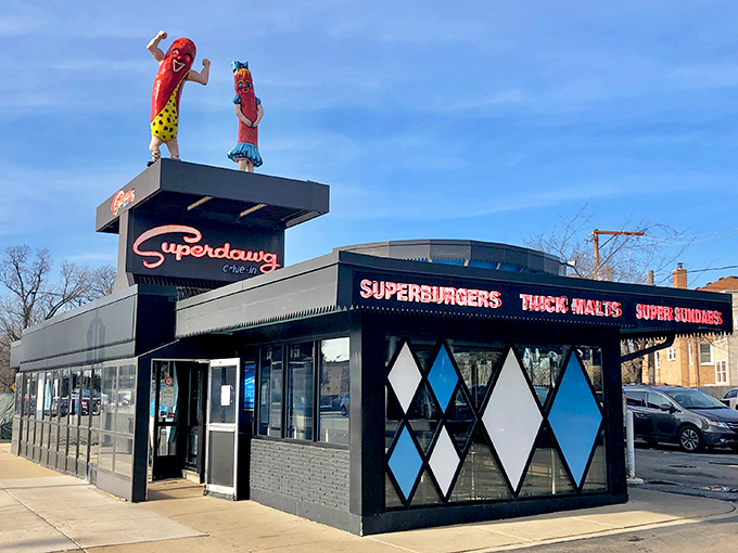 Those iconic hot dog mascots on the roof aren't just decoration—they're Chicago landmarks keeping watch over Milwaukee Avenue like culinary superheroes in a city that takes its wieners seriously.