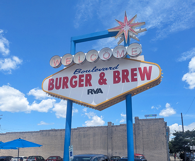 The Vegas-style sign beckons like a neon promise of deliciousness. Boulevard Burger & Brew's retro charm shines even in daylight.