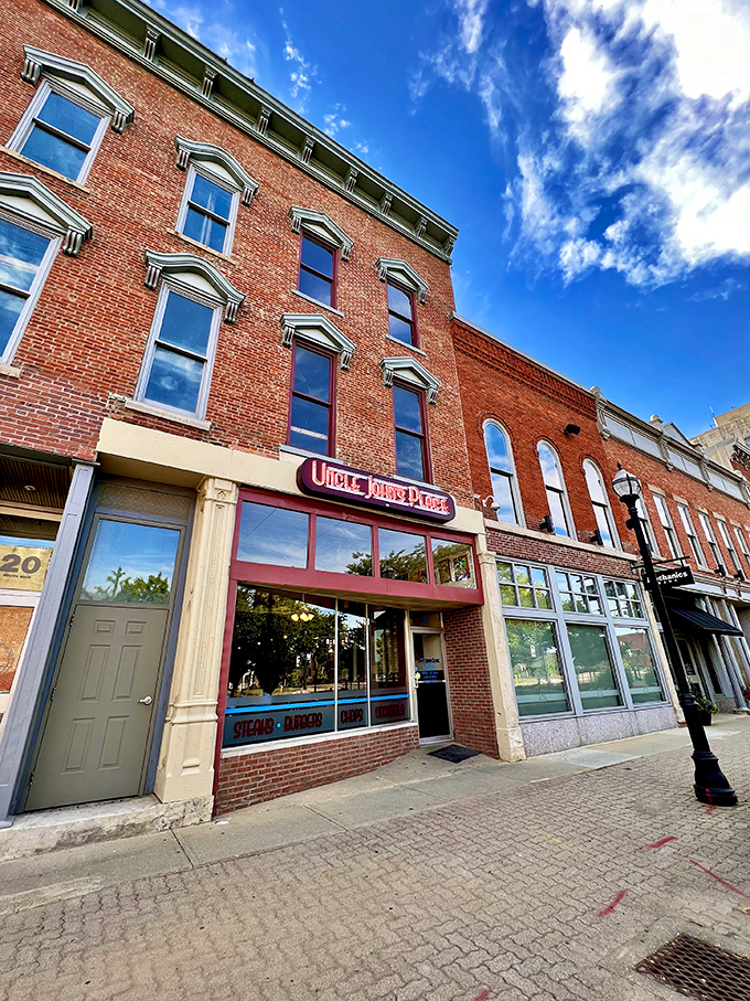 The historic brick fa&ccedil;ade of Uncle John's Place stands proudly on Mansfield's main strip, a culinary beacon that's been drawing hungry pilgrims for generations.