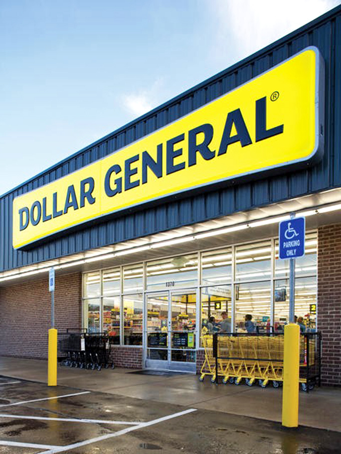 The iconic yellow sign beckons like a budget-friendly lighthouse, guiding savvy shoppers to this surprisingly well-stocked Dollar General in House Springs.