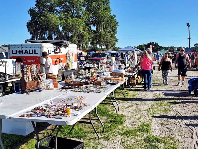 Tables stretching to the horizon like a treasure hunter's dream. One person's castoffs become another's prized discoveries under Florida's generous sunshine.