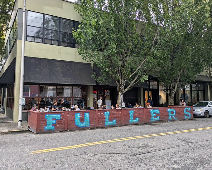 The iconic blue "FULLERS" sign against the rustic red exterior promises no-nonsense deliciousness within. Portland's breakfast faithful know where to gather.