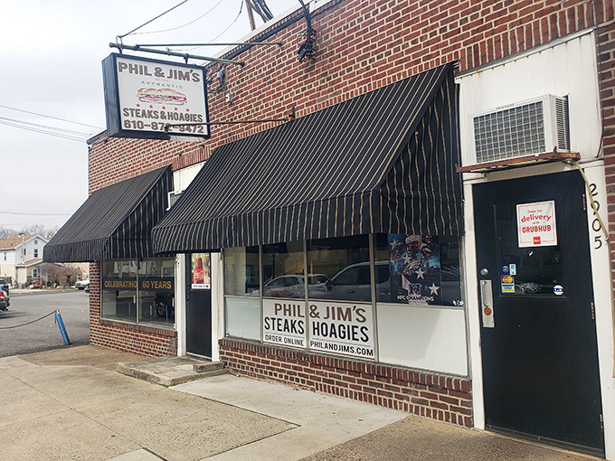 The classic striped awning and vintage sign are like a beacon to sandwich lovers. This unassuming brick storefront houses cheesesteak greatness in Brookhaven.