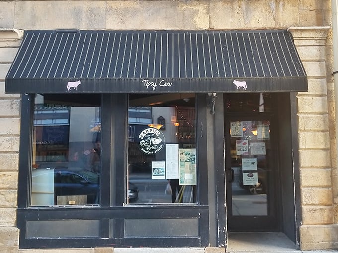 Madison's historic architecture provides the perfect backdrop for Tipsy Cow's welcoming entrance. Like finding a secret passage to comfort food nirvana.