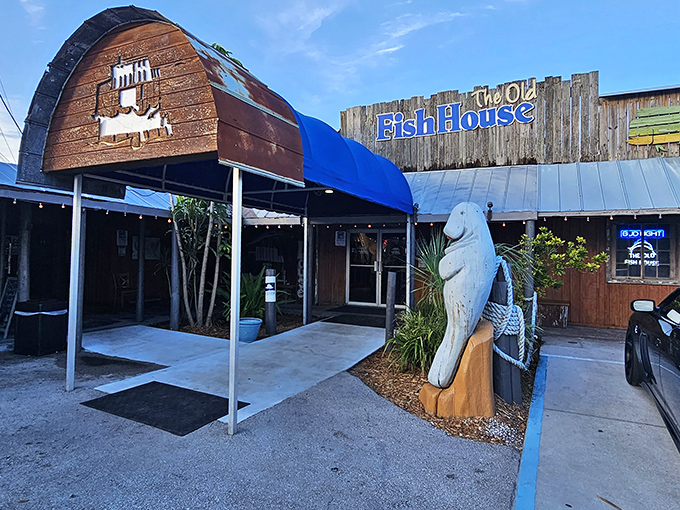 The weathered wooden exterior and iconic manatee statue aren't trying to impress anyone&mdash;they're too busy guarding the entrance to seafood paradise.
