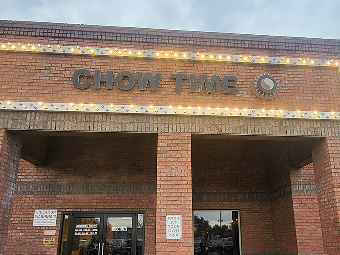 The brick facade of Chow Time welcomes hungry visitors with its no-nonsense approach to dining. Good food awaits inside those doors!