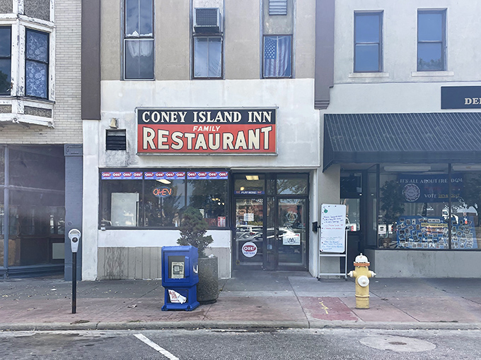 The unassuming storefront of Coney Island Inn stands as a beacon of culinary constancy in downtown Mansfield, where good food trumps fancy facades every time.