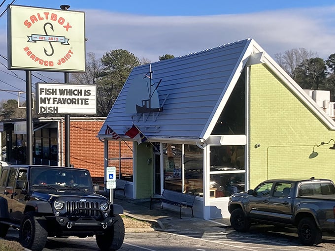 The iconic lime-green saltbox roof isn't just architectural whimsy&mdash;it's a beacon for seafood lovers across Durham, promising simple perfection inside those humble walls.