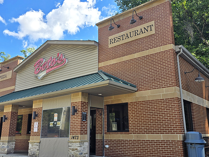 The brick-and-mortar home of pizza rebellion, where Beto's iconic neon sign has been beckoning Pittsburgh pizza pilgrims for decades.
