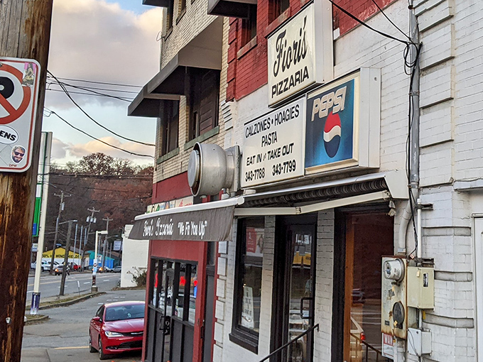 The classic red brick fa&ccedil;ade of Fiori's Pizzaria stands as a beacon of hope for the pizza-deprived. "We Fix You Up" isn't just a motto&mdash;it's a promise.