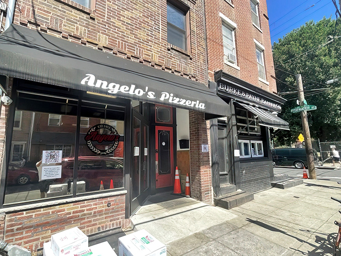 The unassuming storefront of Angelo's Pizzeria on 9th Street hides culinary treasures that have locals and tourists alike standing in epic lines.