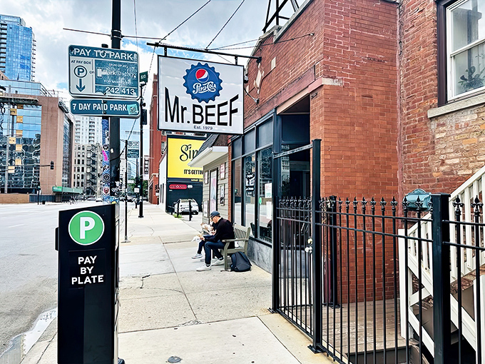 The unassuming brick facade of Mr. Beef hides Chicago's beef sandwich royalty. No fancy frills, just a promise of greatness within.