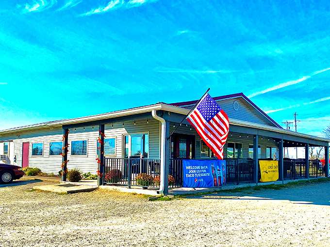 The unassuming exterior of 73 Grill stands like a culinary oasis along State Route 73, complete with American flag proudly waving hello to hungry travelers.