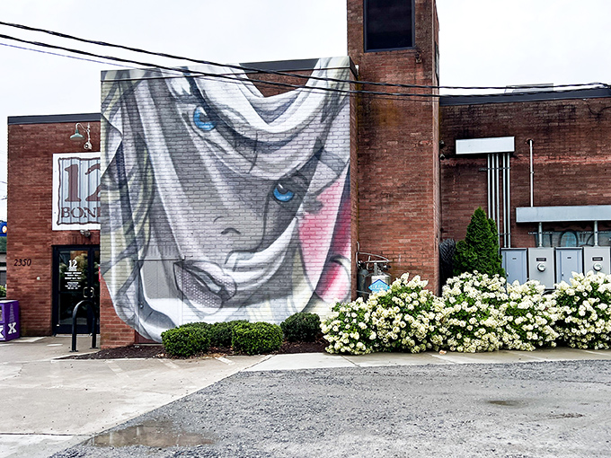 The brick fortress of flavor beckons with its striking mural &ndash; 12 Bones isn't just a restaurant, it's Arden's smoke signal to serious barbecue pilgrims.