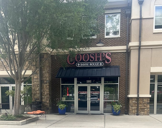 The brick-and-stone facade of Coosh's Bayou Rouge beckons like a Louisiana transplant in the heart of Tallahassee, promising Cajun comfort just beyond those doors.