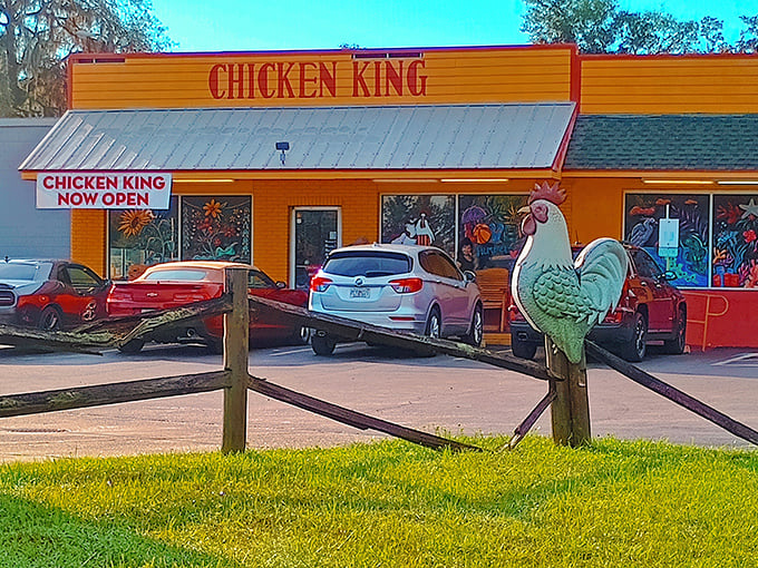 That rooster isn't just decoration&mdash;it's a sentinel guarding the gateway to fried chicken nirvana. The colorful windows hint at the personality waiting inside.