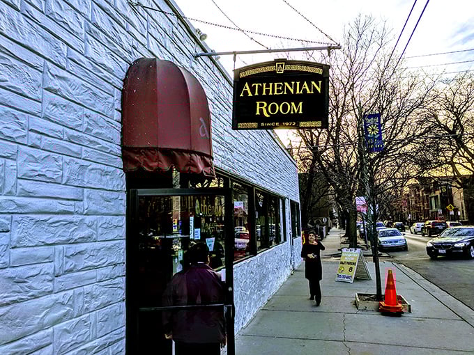The unassuming white exterior of Athenian Room stands like a culinary lighthouse in Lincoln Park, beckoning hungry Chicagoans since 1972.