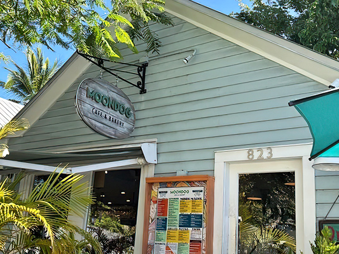The mint-green facade of Moondog Cafe beckons like a tropical oasis, promising culinary adventures behind its unassuming exterior.
