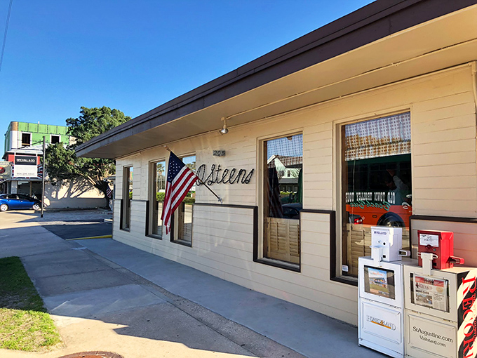 The unassuming exterior of O'Steen's belies the culinary treasures within. That American flag isn't just decoration&mdash;it's a promise of classic Florida goodness.