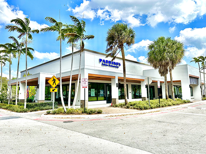 Another angle reveals Padrino's clean lines and inviting entrance, where Florida sunshine bounces off white walls that hide delicious secrets.