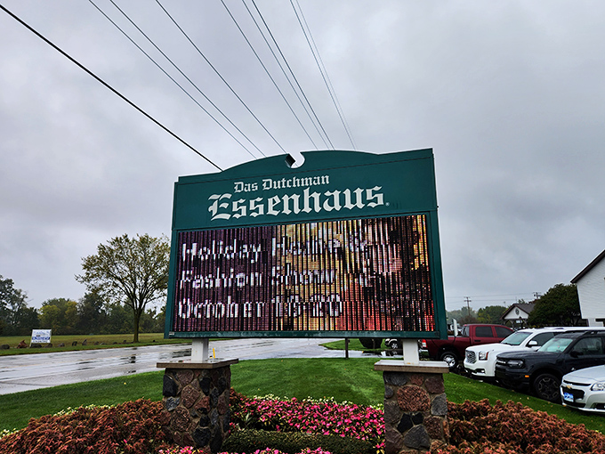 The iconic green sign welcomes hungry travelers to Das Dutchman Essenhaus, standing like a beacon of comfort food amid Indiana's rolling countryside.