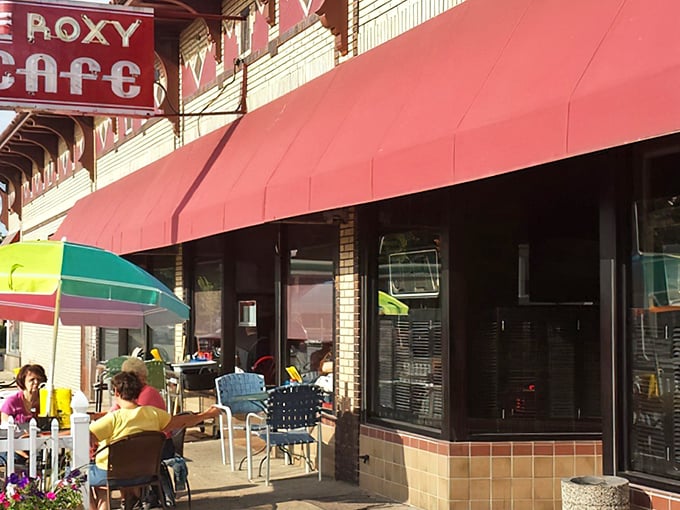 The iconic red awning of Roxy Cafe beckons hungry travelers like a breakfast lighthouse on Jackson's main drag.