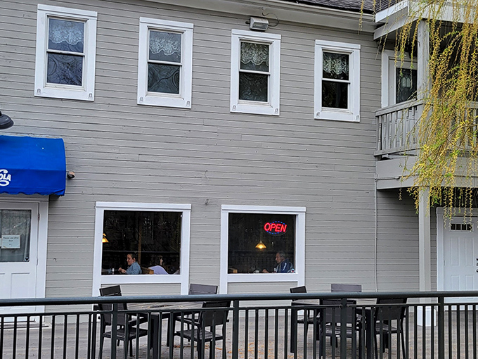 The iconic exterior, complete with outdoor dining, stands as a time portal to when diners were the beating heart of American communities.