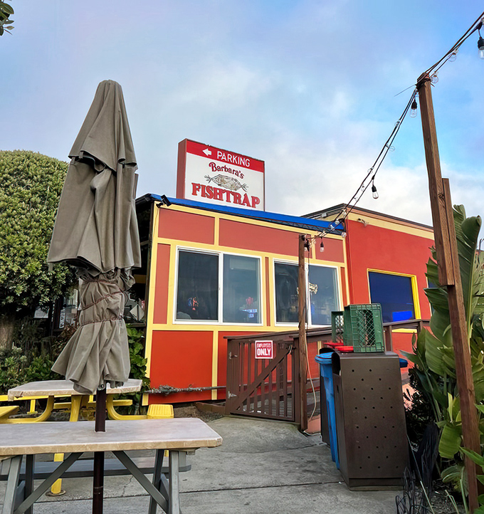 The bright red exterior of Barbara's Fishtrap stands out like a cheerful beacon for seafood lovers. No architectural awards here&mdash;just the promise of honest-to-goodness ocean treasures inside.