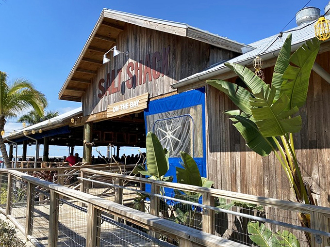 The weathered wooden exterior of Salt Shack on the Bay isn't trying to impress you&mdash;it's saving all that energy for what's on your plate.