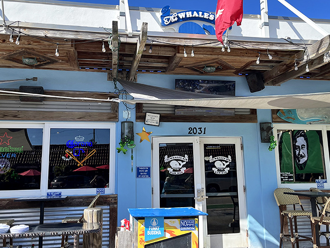 A closer look at the entrance reveals weathered wood details and nautical touches &ndash; like a restaurant that sailed in from a Jimmy Buffett song.