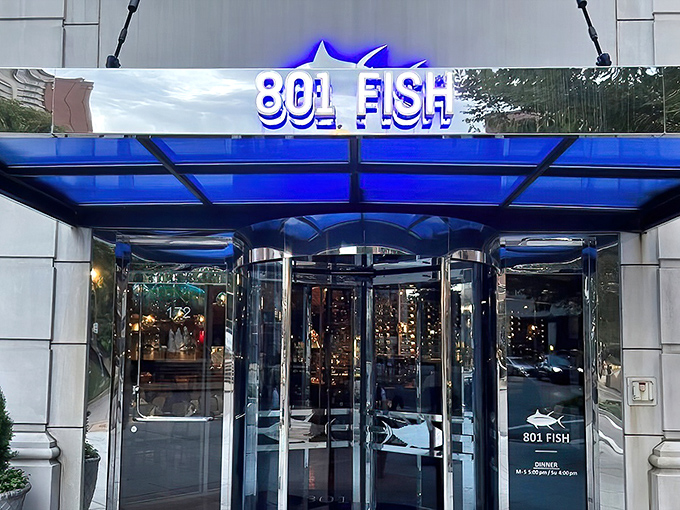 The blue glow of 801 Fish's exterior sign beckons like a lighthouse for seafood lovers lost in a Midwest desert of landlocked dining options.