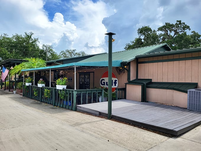 A slice of New England in the Sunshine State, The Nauti Lobstah's exterior promises maritime delights with its green-trimmed facade and inviting deck.