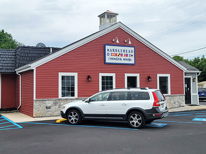The iconic red barn exterior of Marblehead Chowder House stands like a New England lighthouse in Pennsylvania, beckoning seafood lovers from miles around.