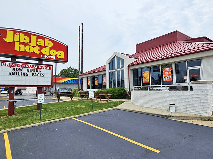 The iconic red roof and cheerful signage of Jib Jab beckons like a lighthouse for the hungry navigator. No pretension, just the promise of frankfurter perfection.