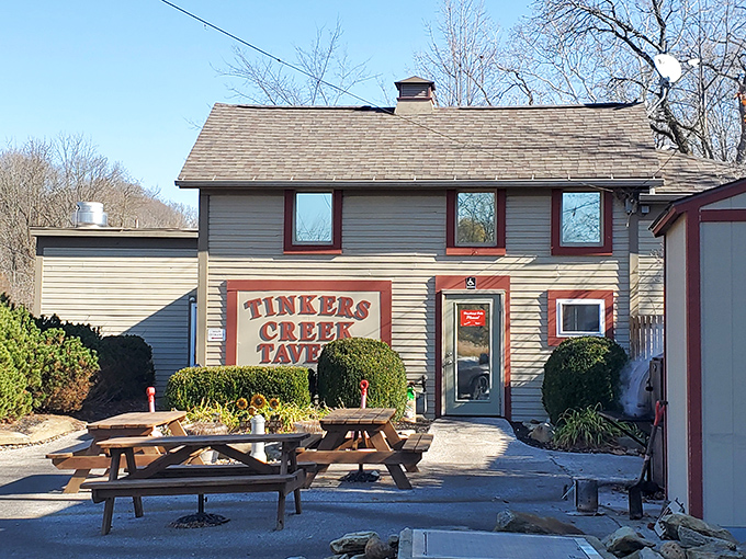 The cream-colored exterior with burgundy trim feels like a warm invitation, promising comfort food and conversation in equal measure.