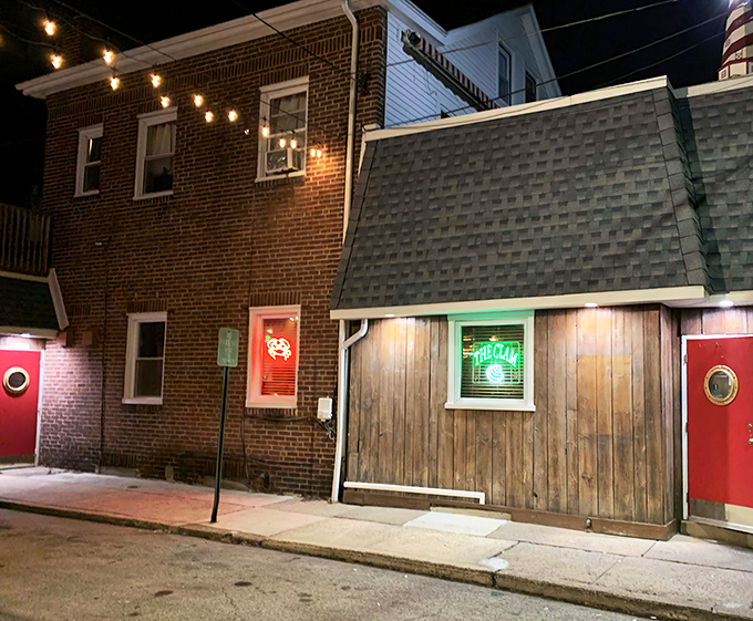 The wooden-shingled exterior with its iconic red doors stands like a maritime beacon on Edgemont Avenue, promising seafood treasures within.