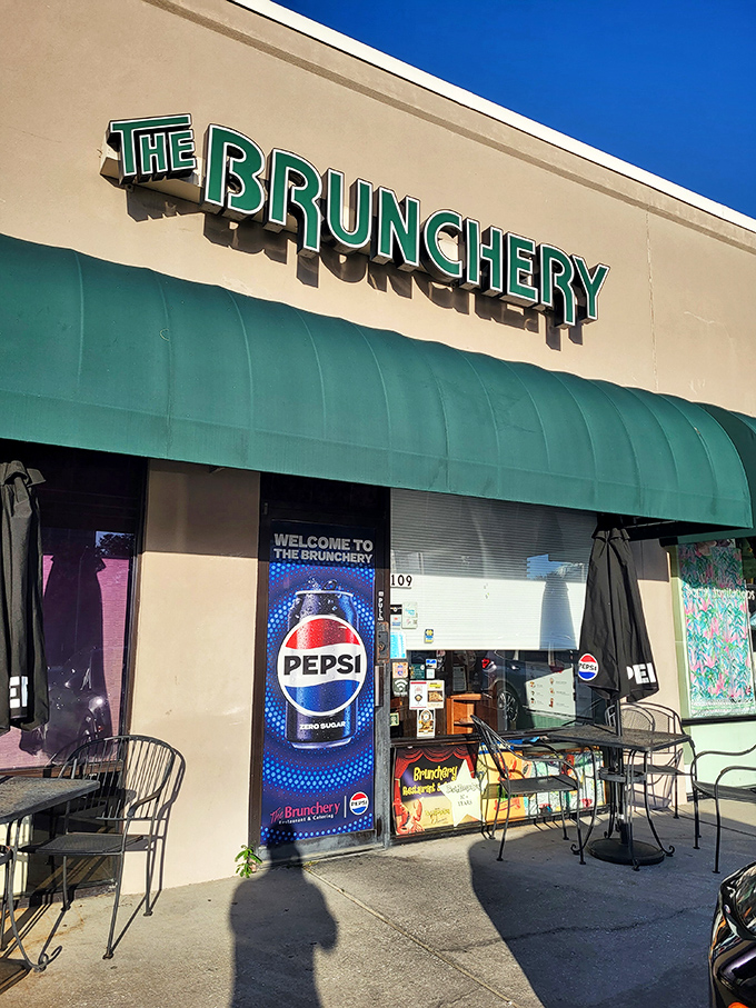 The unassuming green awning of The Brunchery beckons like a breakfast beacon in South Tampa, promising homestyle delights within.