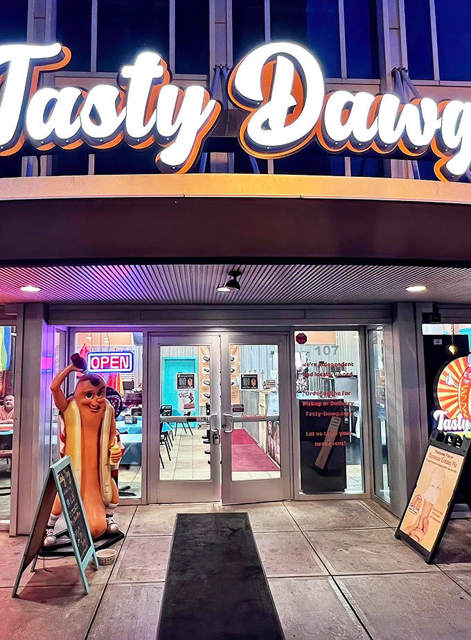 The hot dog mascot standing guard outside Tasty Dawg is like Columbus's unofficial greeter, welcoming hungry souls to hot dog paradise.