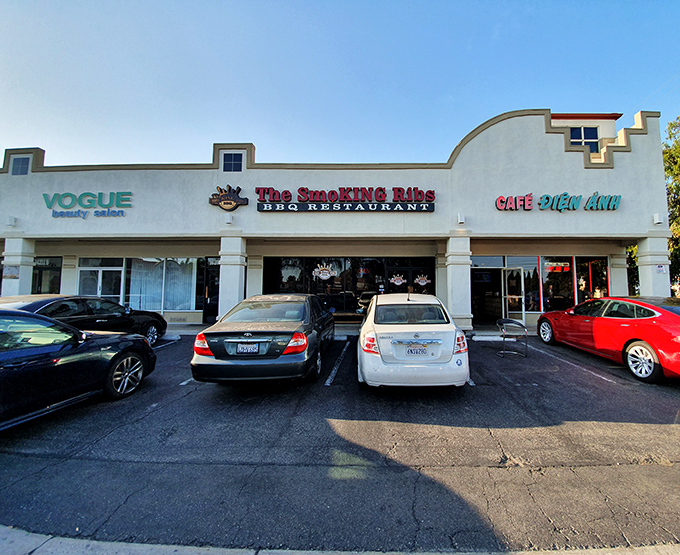 Nestled between a beauty salon and caf&eacute;, The Smoking Ribs proves that culinary treasures often hide in plain sight. The parking lot's perpetual fullness tells you everything you need to know.