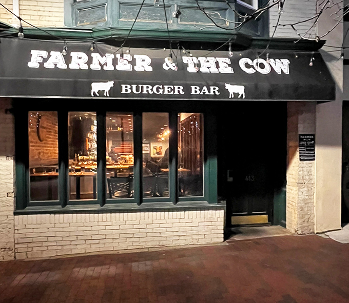 With its simple black awning and crisp white lettering, the modest fa&ccedil;ade of Farmer & The Cow quietly hints at the culinary gems waiting inside &mdash; a delicious reminder that great food doesn&rsquo;t always need a flashy entrance.