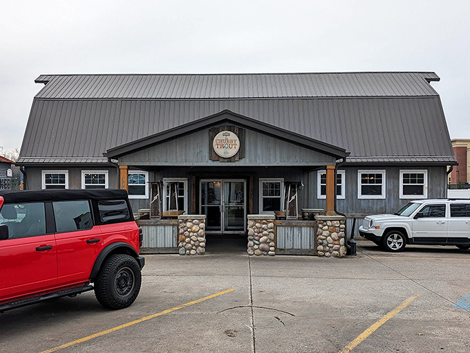 The rustic charm of The Chubby Trout's exterior promises a seafood experience that feels more Maine lodge than Midwest eatery.