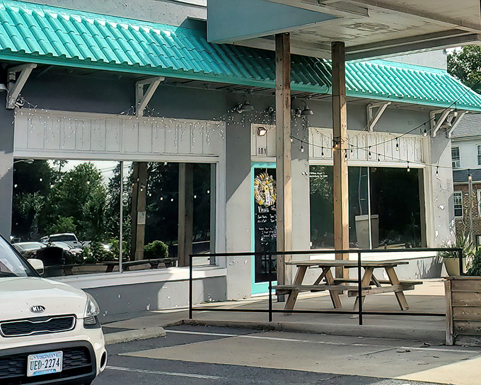 That distinctive turquoise awning serves as a beacon of hope for the sugar-deprived. Like a lighthouse guiding ships to shore, it guides the hungry to donut nirvana.